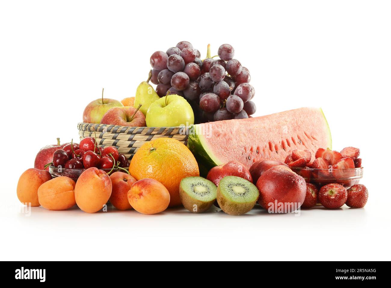 Composition with variety of fruits and wicker basket Stock Photo - Alamy