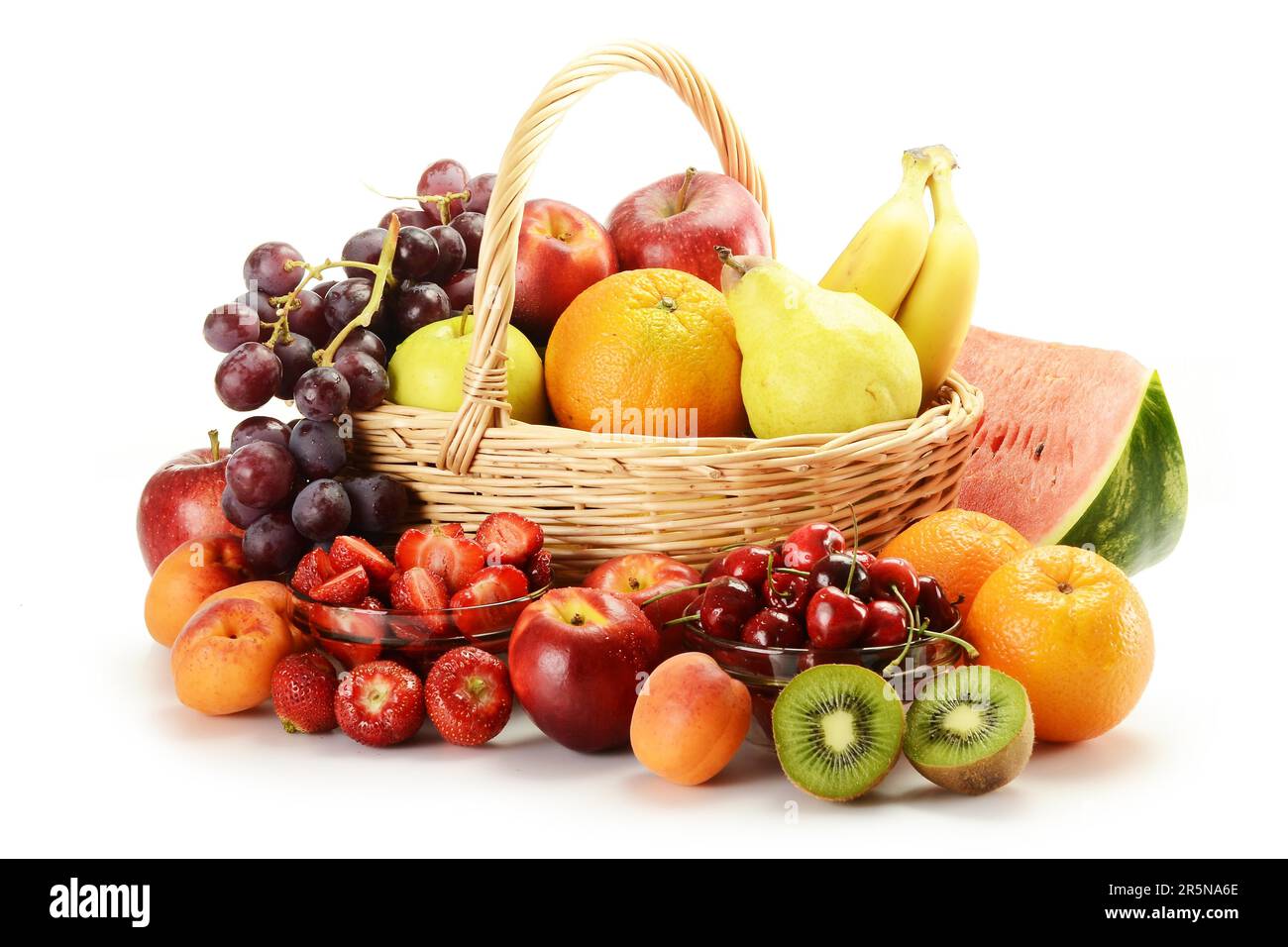 Composition with variety of fruits and wicker basket Stock Photo - Alamy