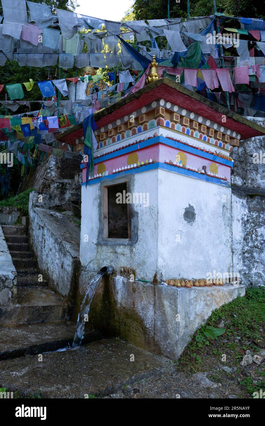 Shrine with Buddhist flags in Bhutan Stock Photo - Alamy