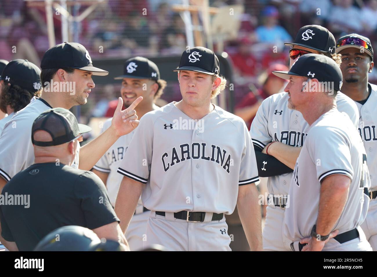 South Carolina pitcher Eli Jones, center, and Will Sanders, left, talk ...