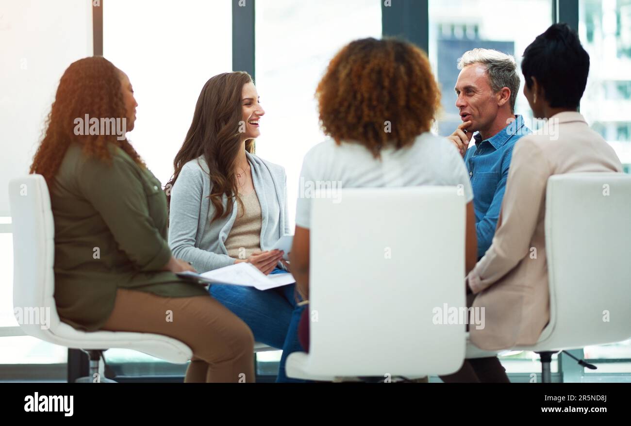 Embracing collaboration for its many benefits. a team of colleagues ...