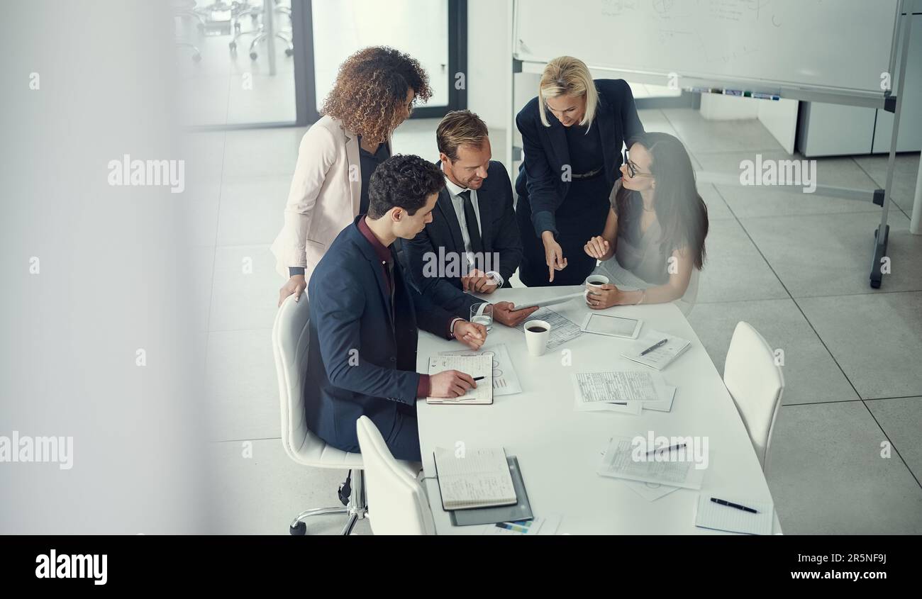 Work with the best, be the best. a group of colleagues using digital ...