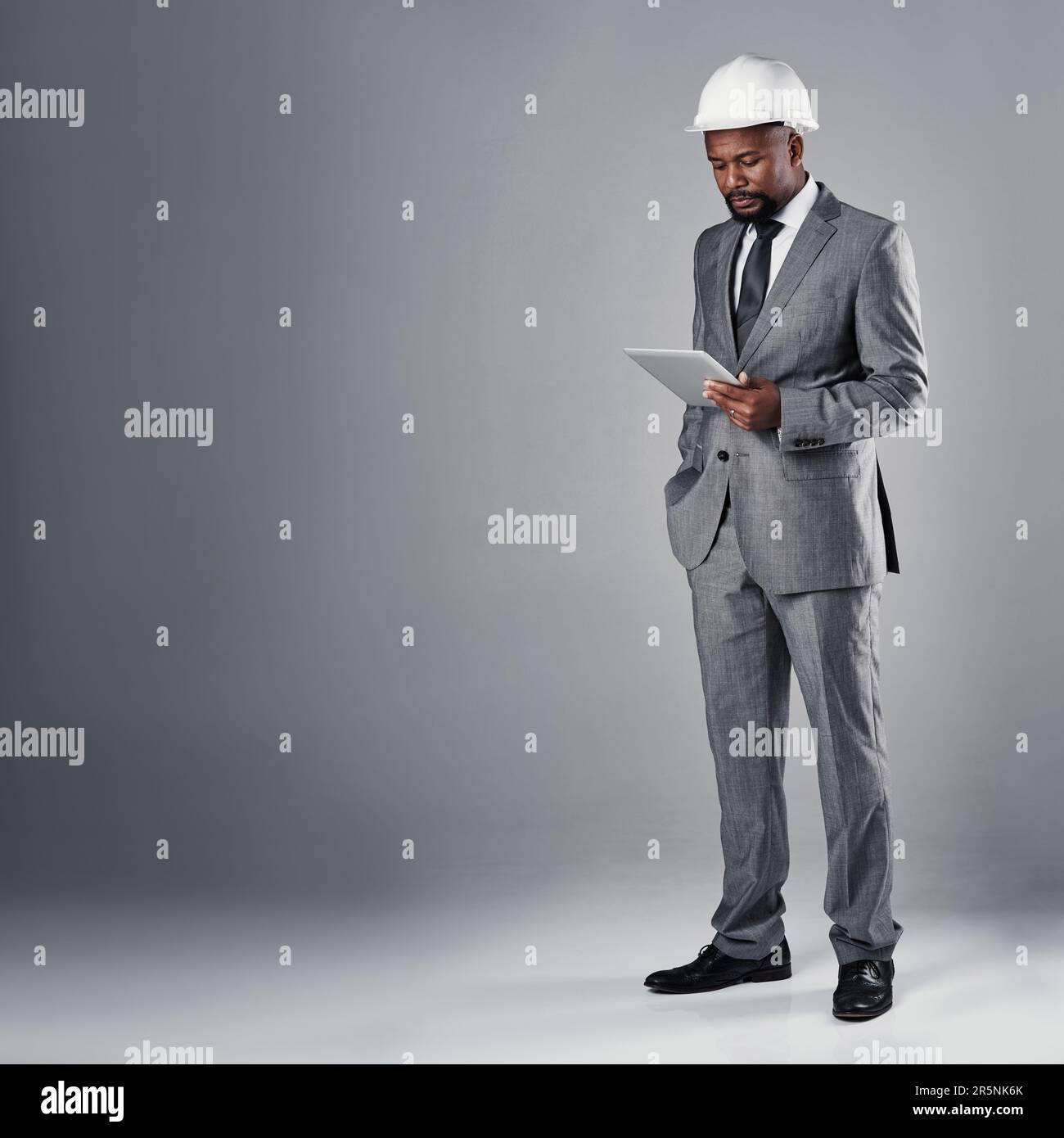 Access to his building plans anytime, anywhere. a well-dressed civil ...