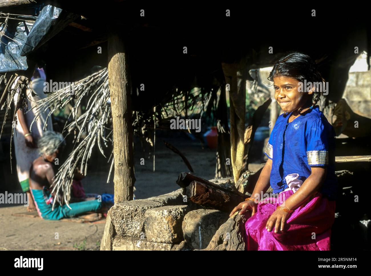 Betta kurumba tribal girl child sitting the tribal settlement at ...