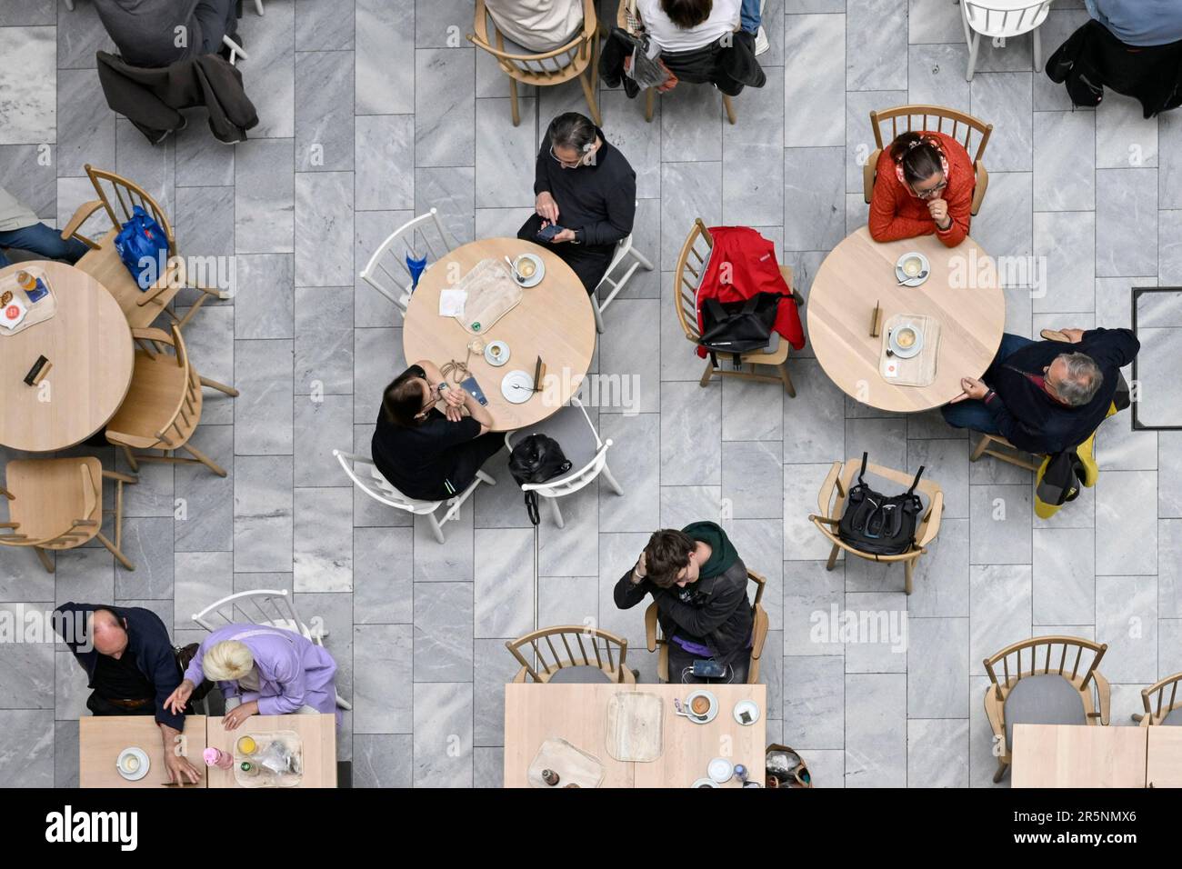 Cafe guests bird's eye view Stock Photo - Alamy