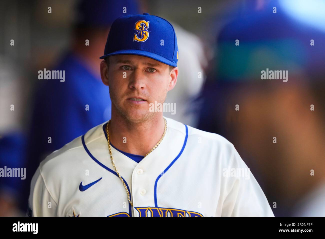 Seattle Mariners relief pitcher Trevor Gott walks in the dugout during ...