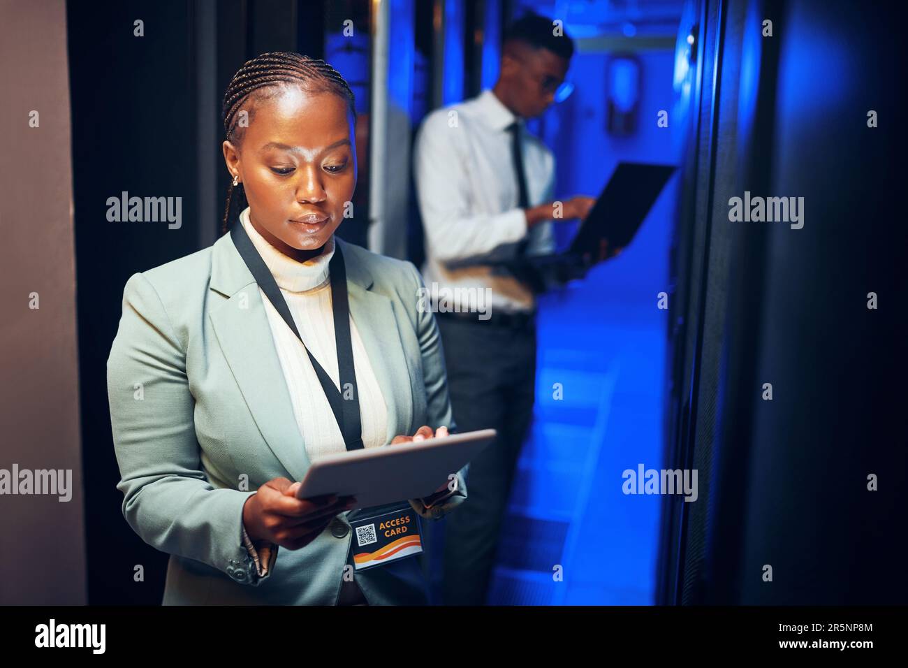 Fixing System Errors With Speed A Young Woman Using A Digital Tablet While Working In A Server