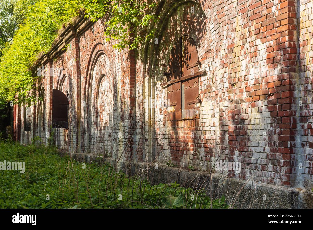 Old red brick military building on Vallisaari island in Helsinki ...