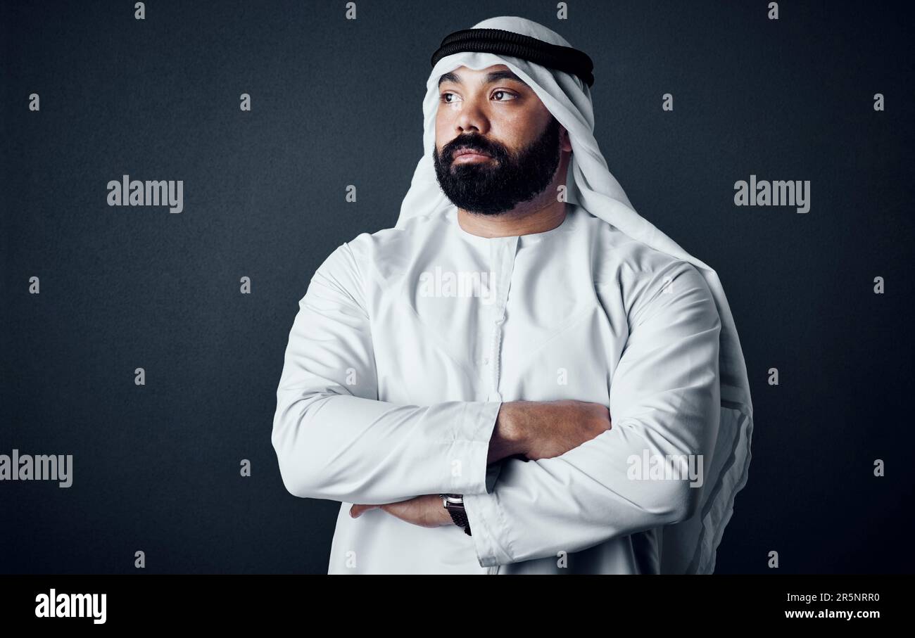 The traditional man about his business. Studio shot of a young man ...