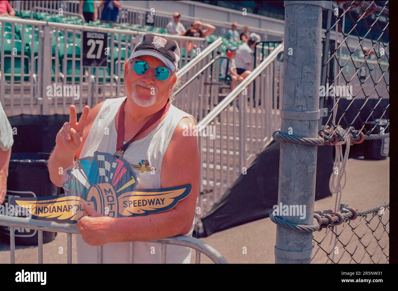 INDIANAPOLIS, INDIANA, UNITED STATES - 2023/05/22: A race fan watches ...