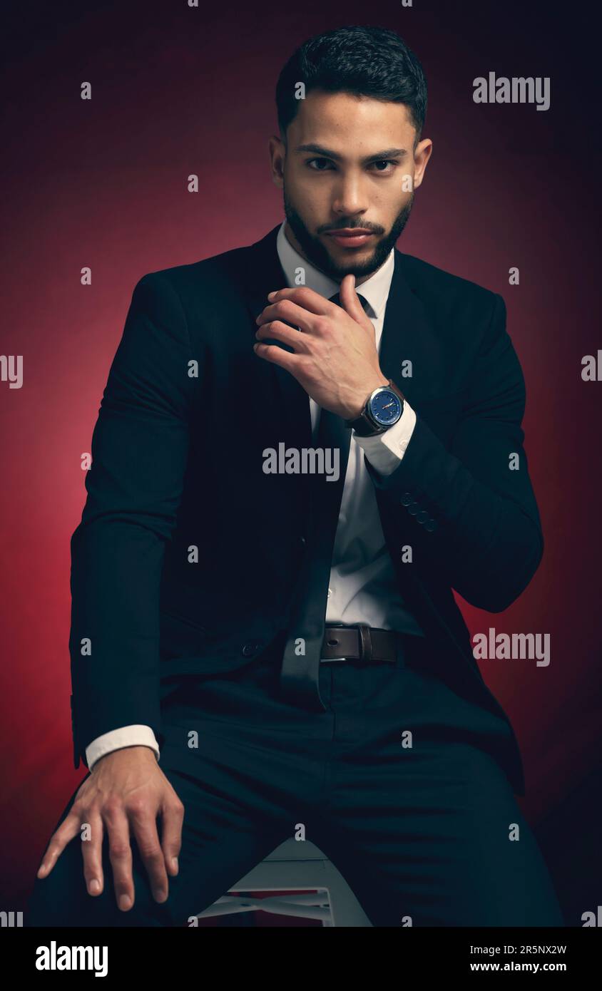 Young man, suit and studio portrait with business fashion, dark and ...