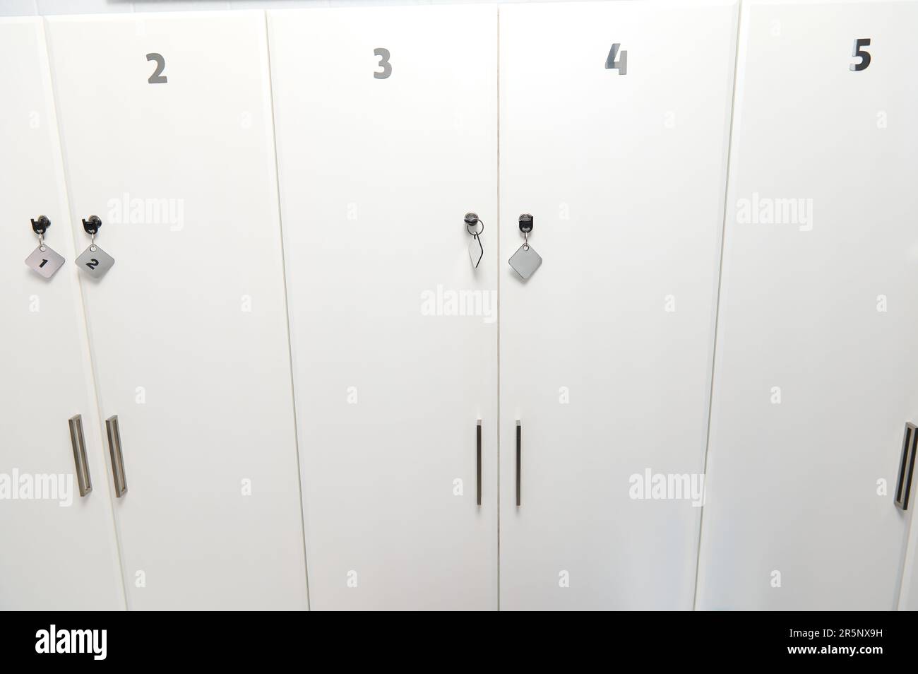 White numbered lockers in the corridor of the waiting room of a medical ...
