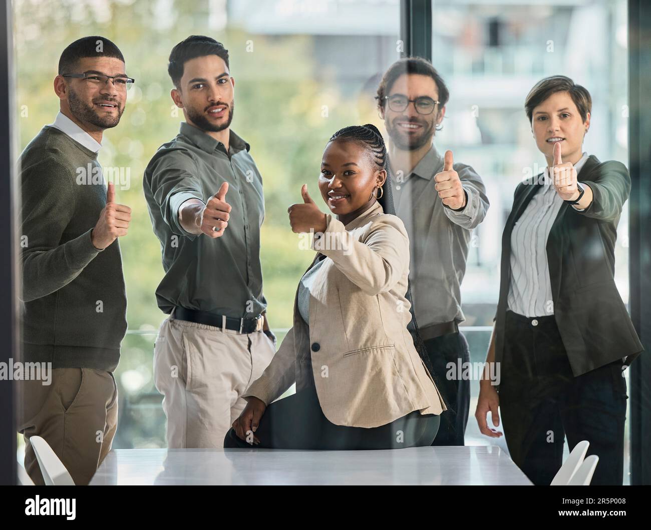 Happy, success or portrait of business people with thumbs up or ...