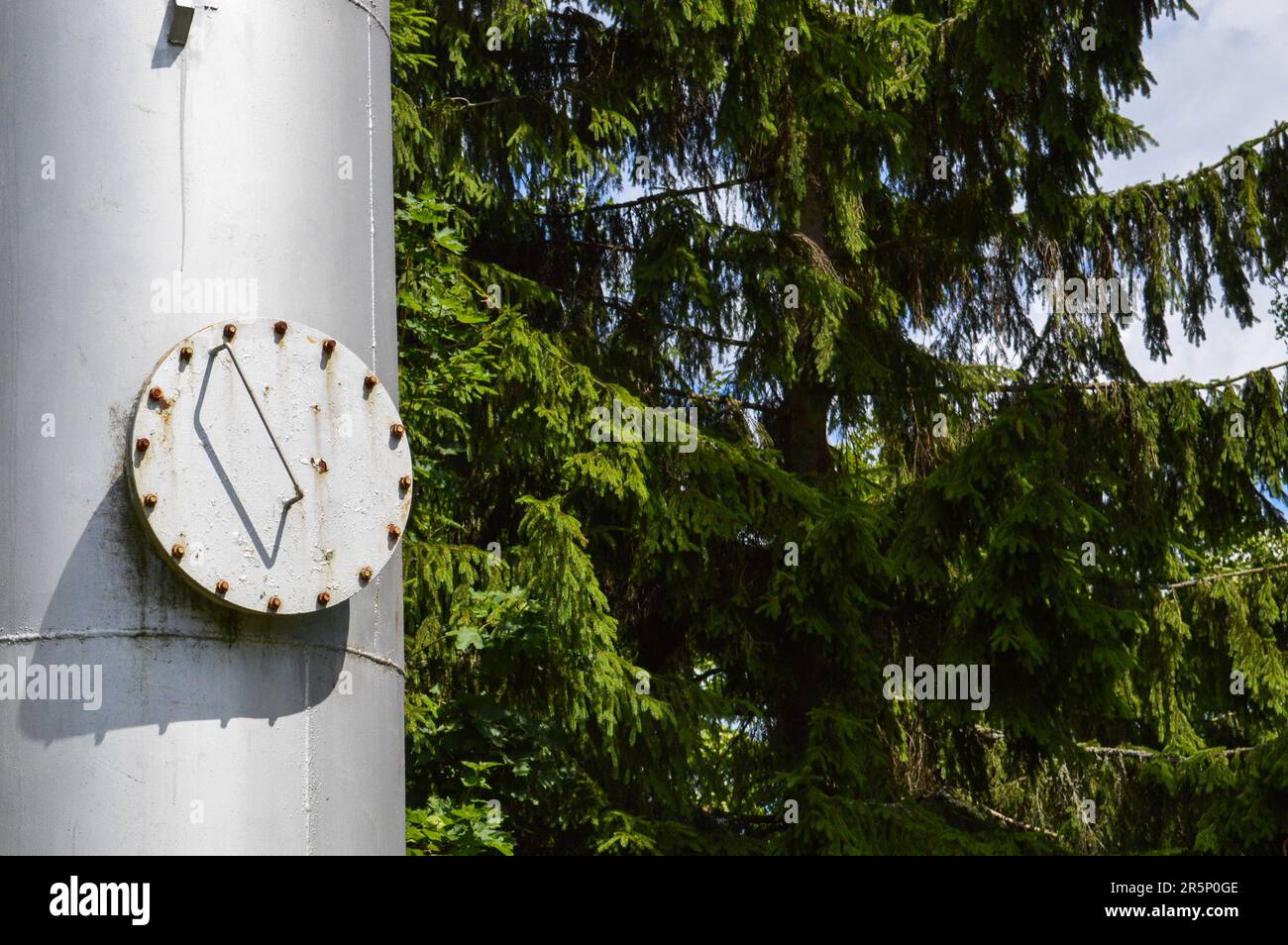 Large iron metal stainless brilliant industrial tank column with a ...