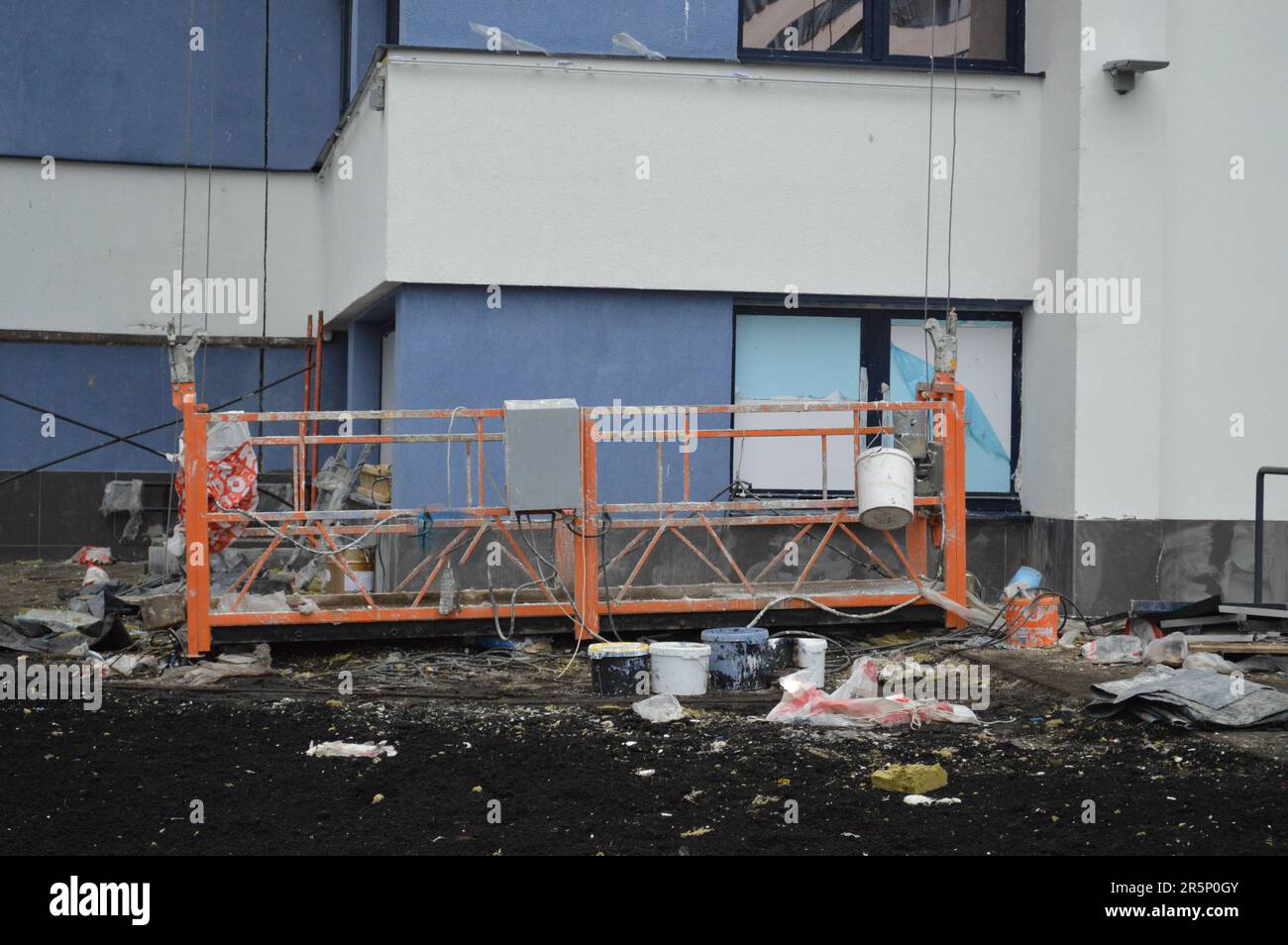 Large iron metal building facade elevator cradle for lifting workers ...