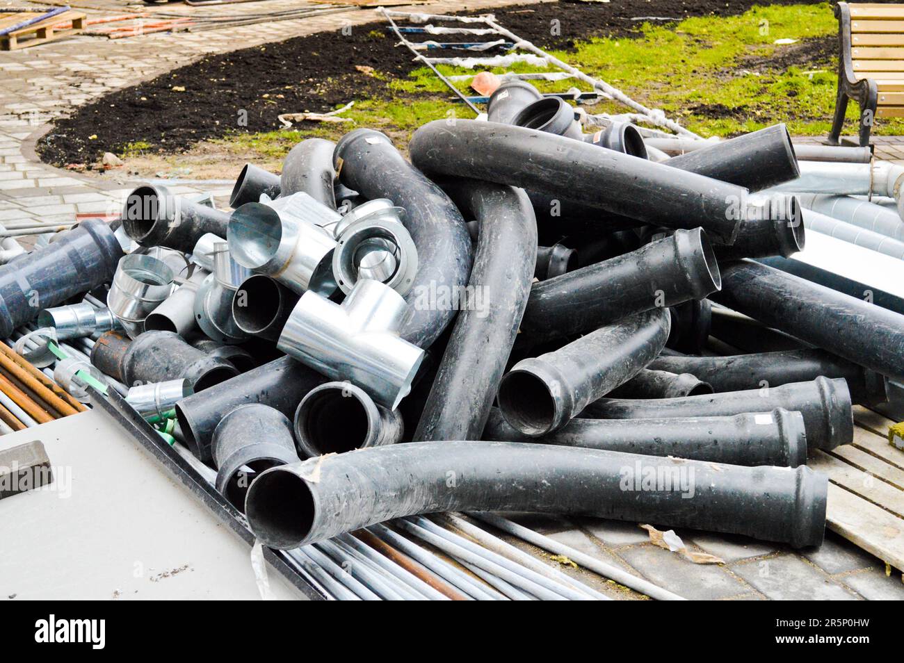 Large black plastic sewer plumbing pipes for the construction of water ...