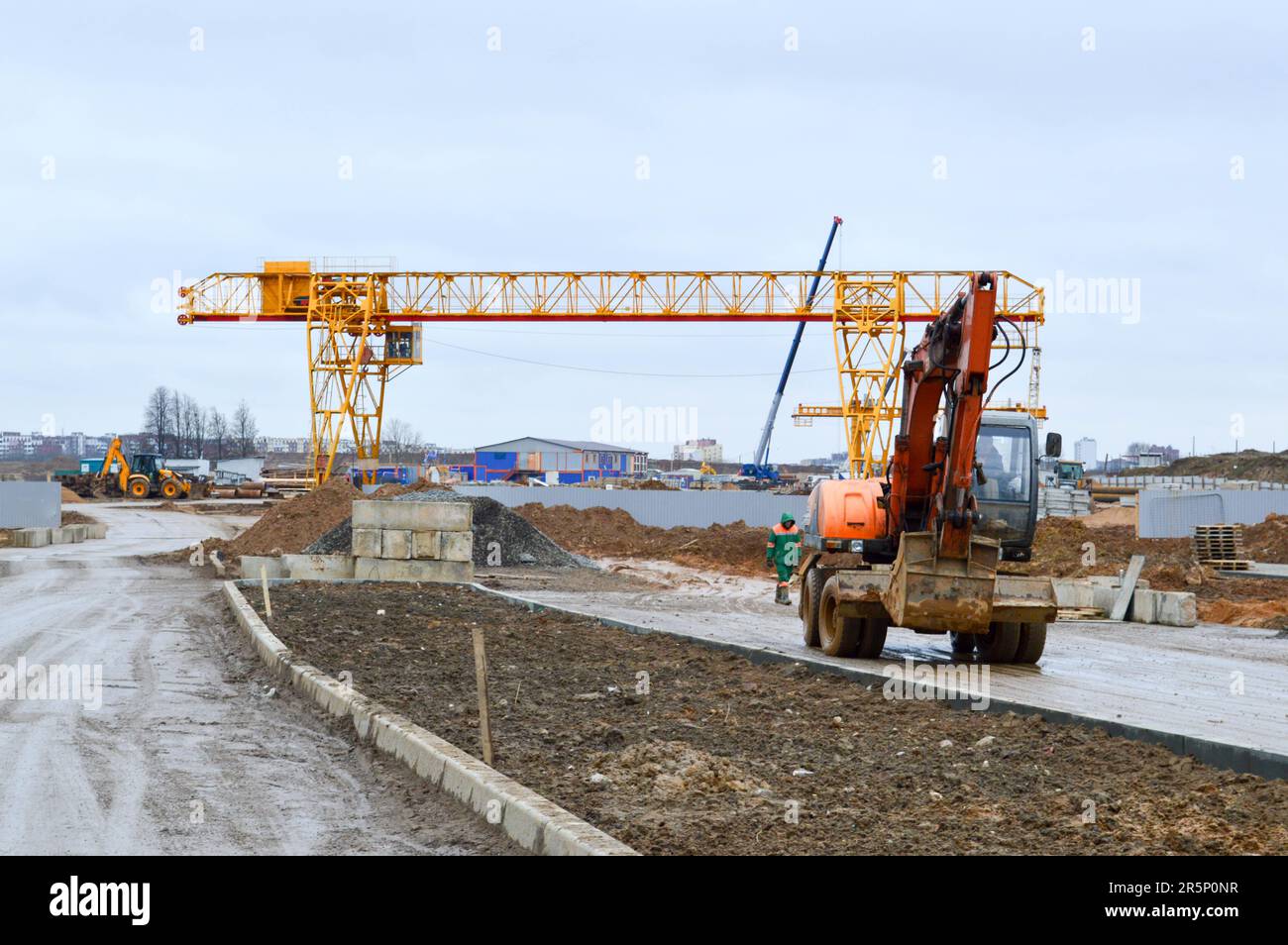Big bright yellow powerful industrial heavy excavator tractor ...
