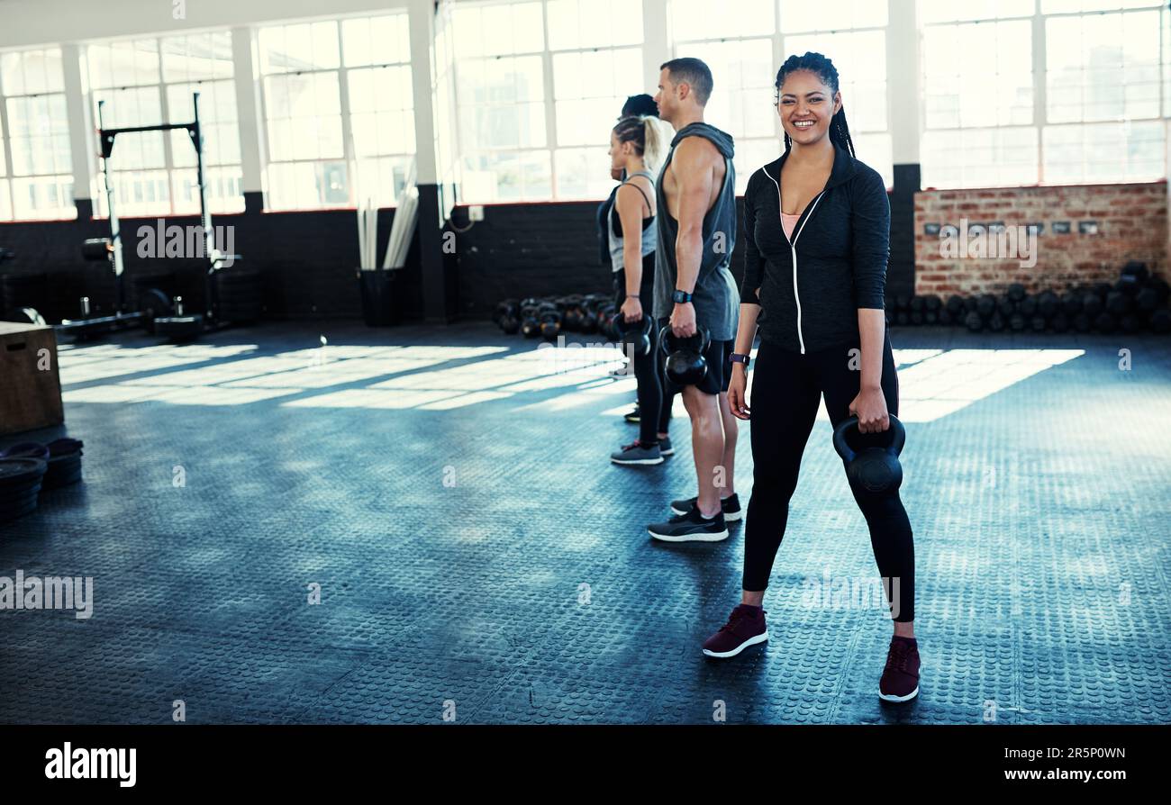 Form is a must. a cheerful group of young people standing in a row and ...