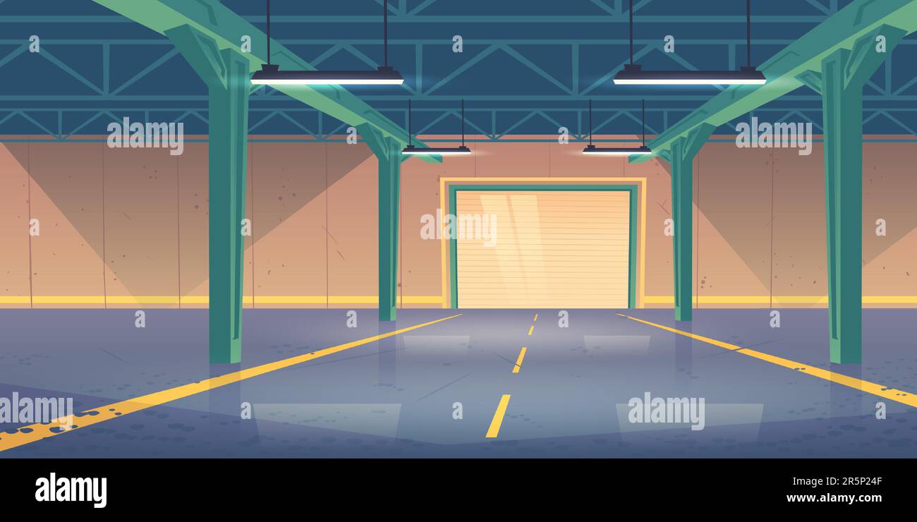 Empty warehouse interior with rolling shatter gates, concrete flooring ...