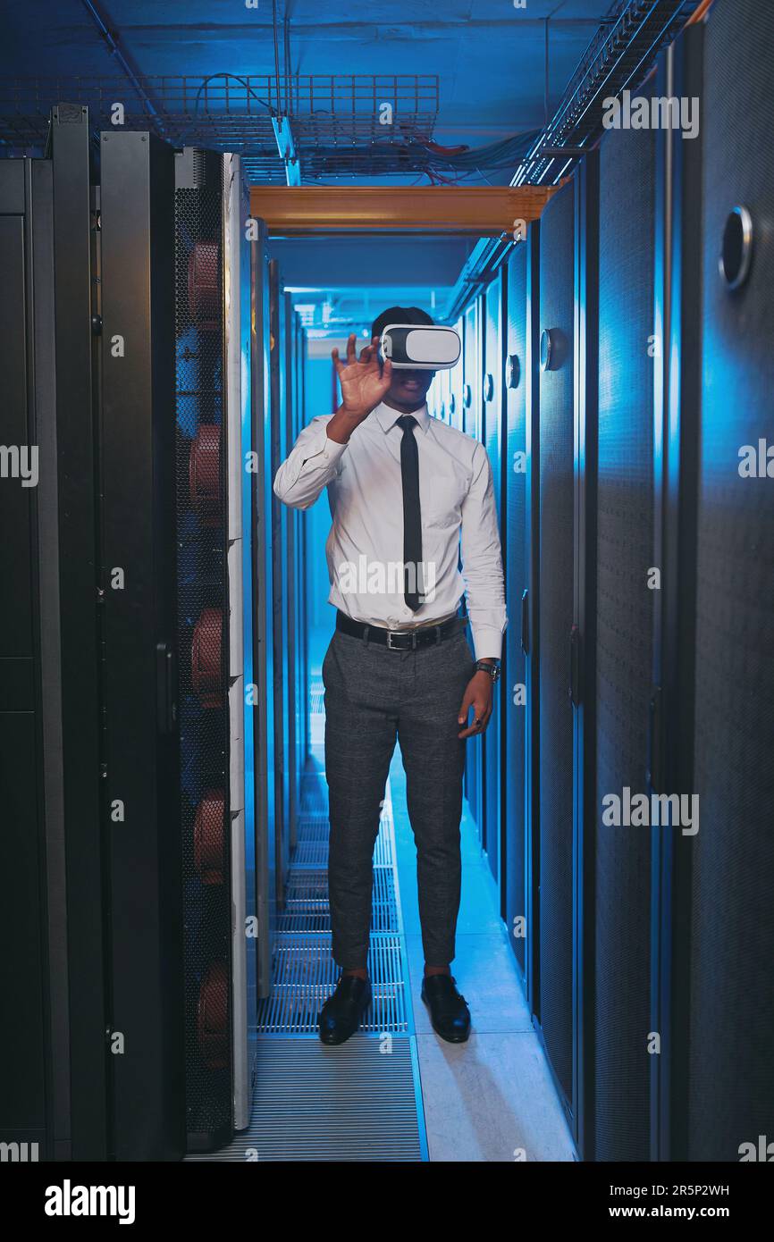 Carrying technology into the future. Full length shot of a young IT ...