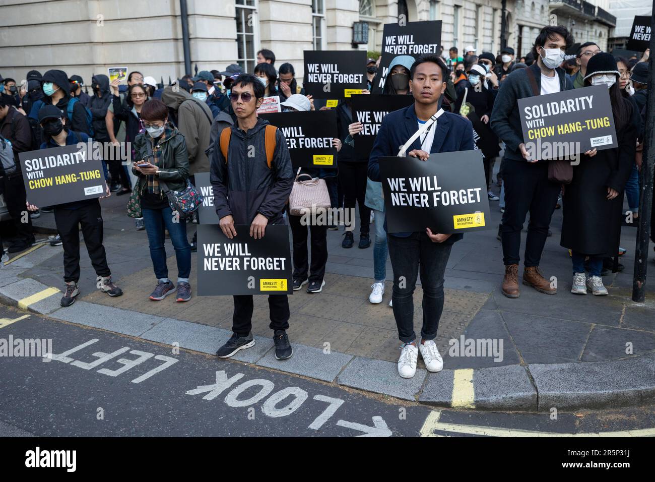 London, UK. 04th June, 2023. Participants are seen holding posters ...