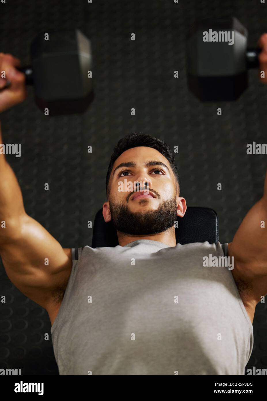Bench press, workout and man with weight in gym for fitness ...