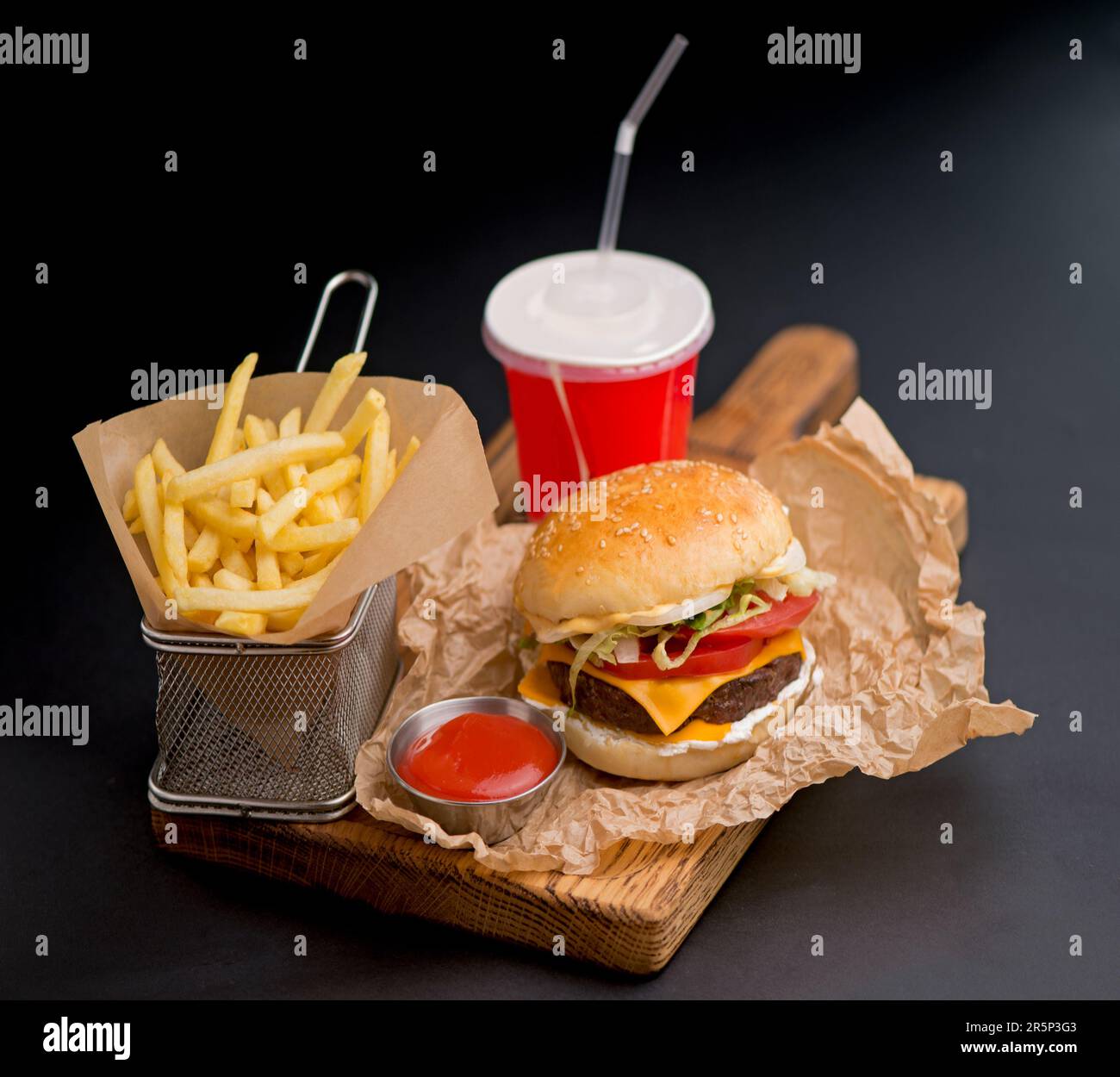 Classic burgers with becon, meat, cheese, onion, tomato and cheese and ...