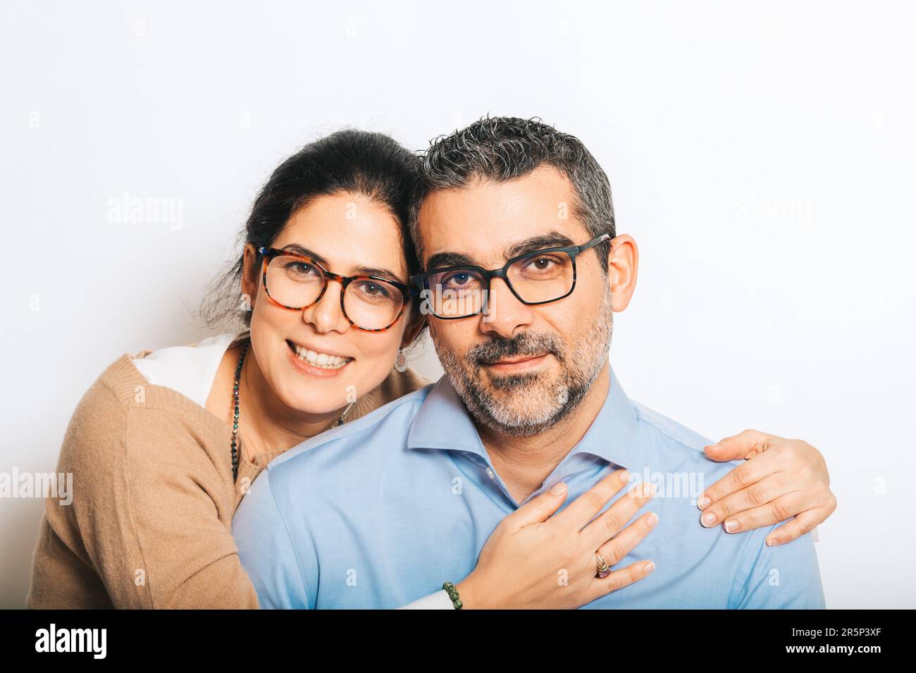 Happy romantic hispanic couple embracing hi-res stock photography and ...