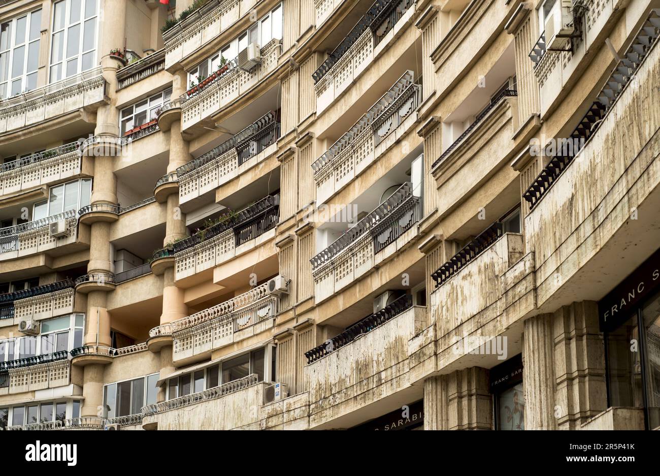 Close up detail with a old built apartment building in Bucharest ...