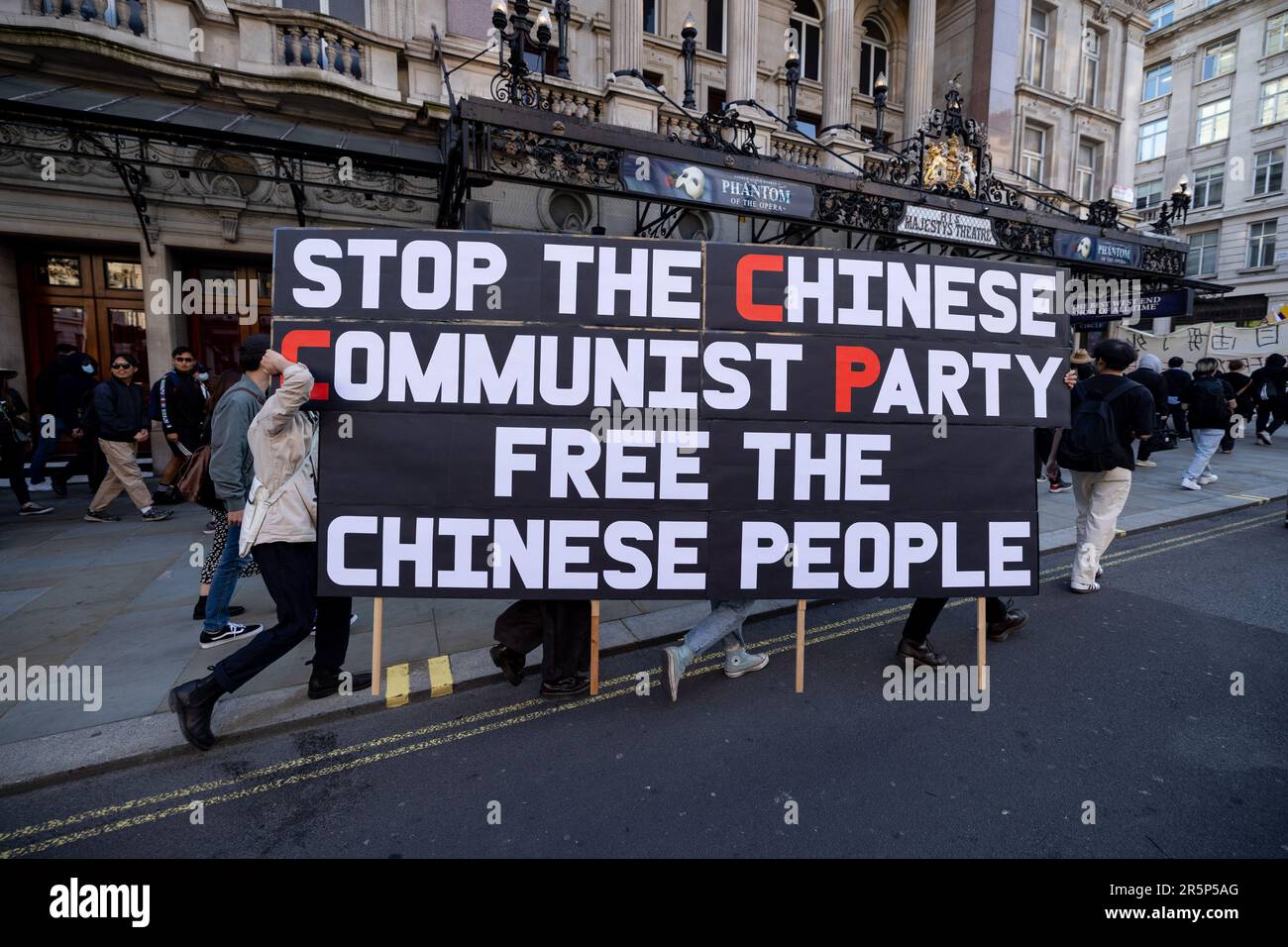 London, UK. 04th June, 2023. Protesters are seen marching with a ...