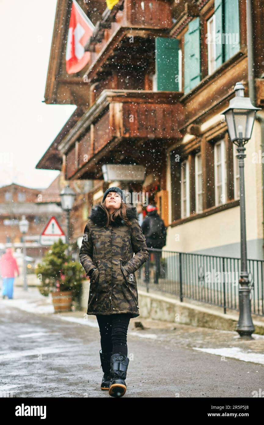 Seasonal outdoor portrait of happy young woman enjoying nice sunny ...