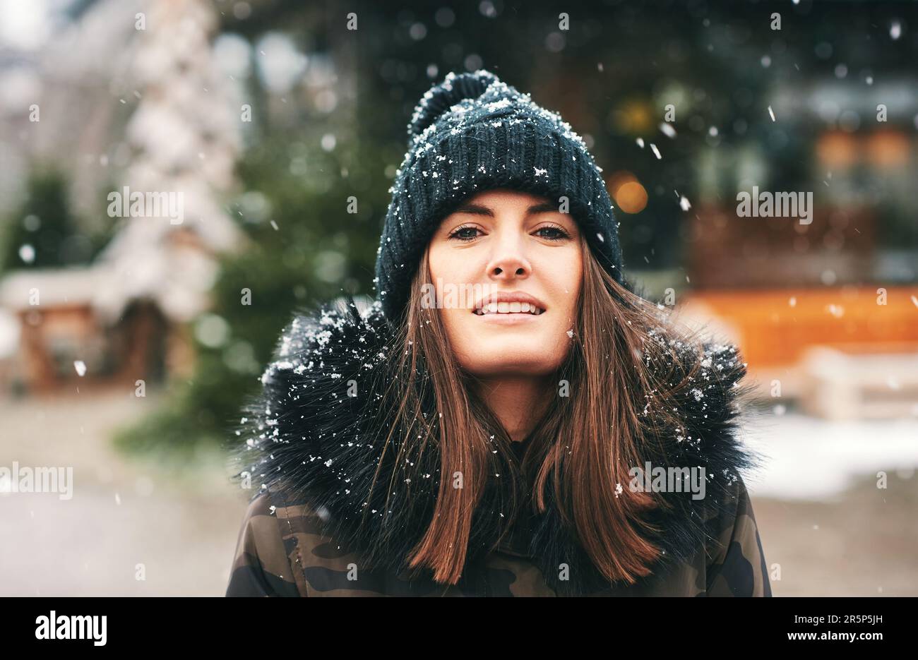 Seasonal outdoor portrait of happy young woman enjoying nice sunny ...