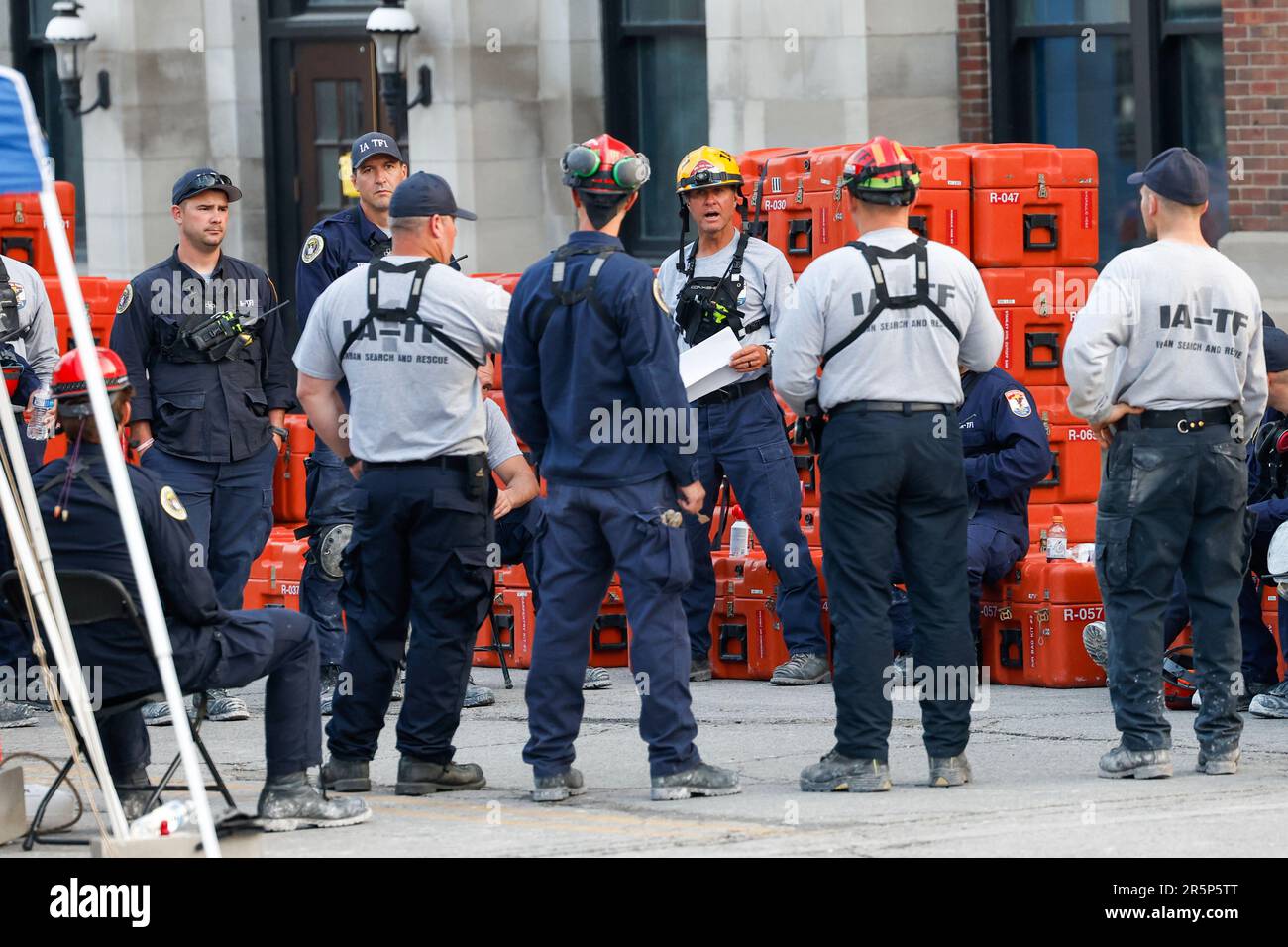Iowa Task Force 1, Urban Search and Rescue, gather outside The ...