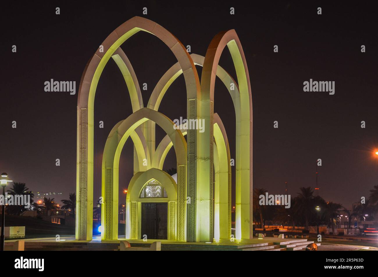 Night view of arch sculpture at al Bida park in Doha, Qatar Stock Photo ...