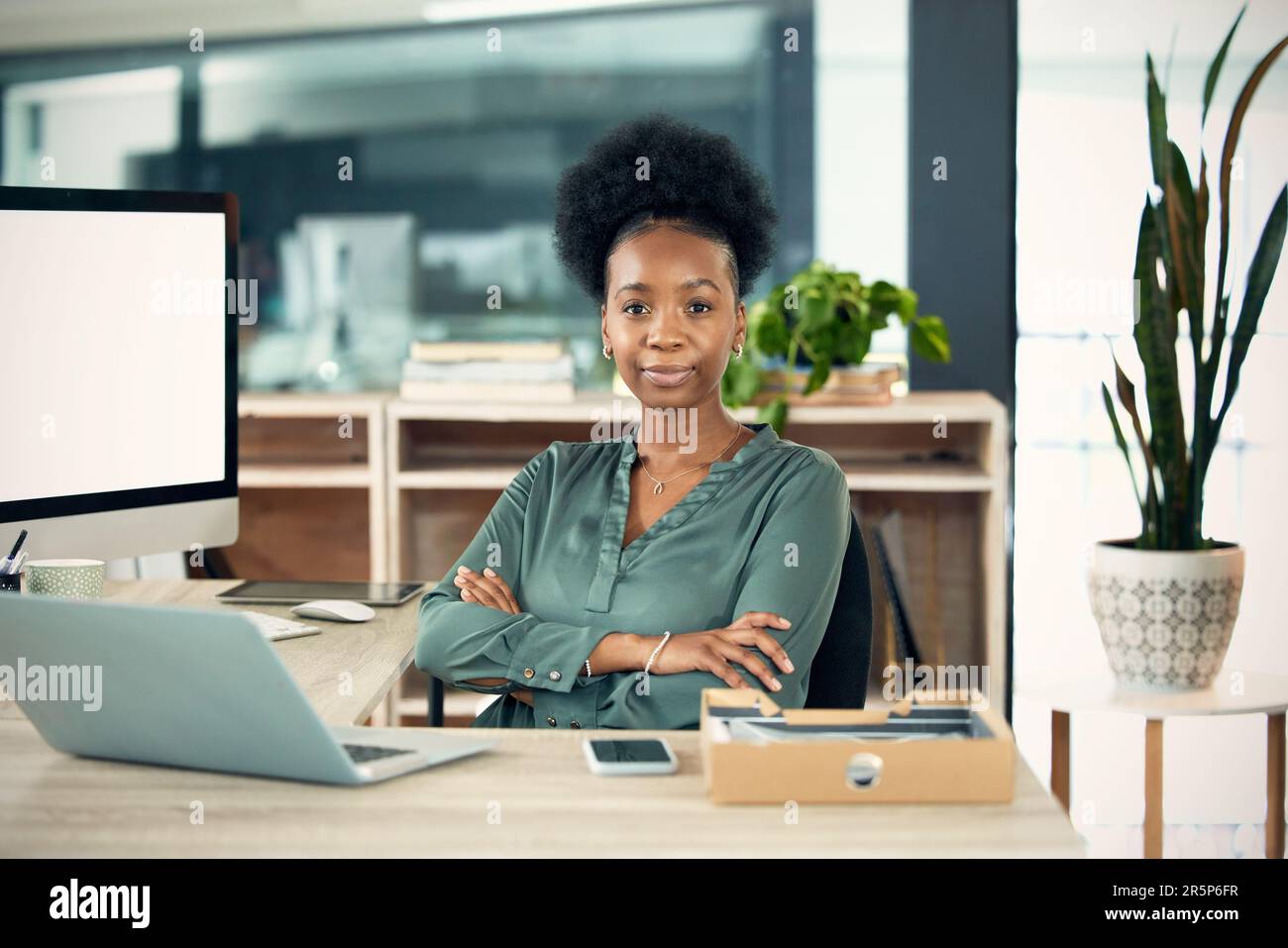 Portrait, black woman and accountant with arms crossed, laptop and ...