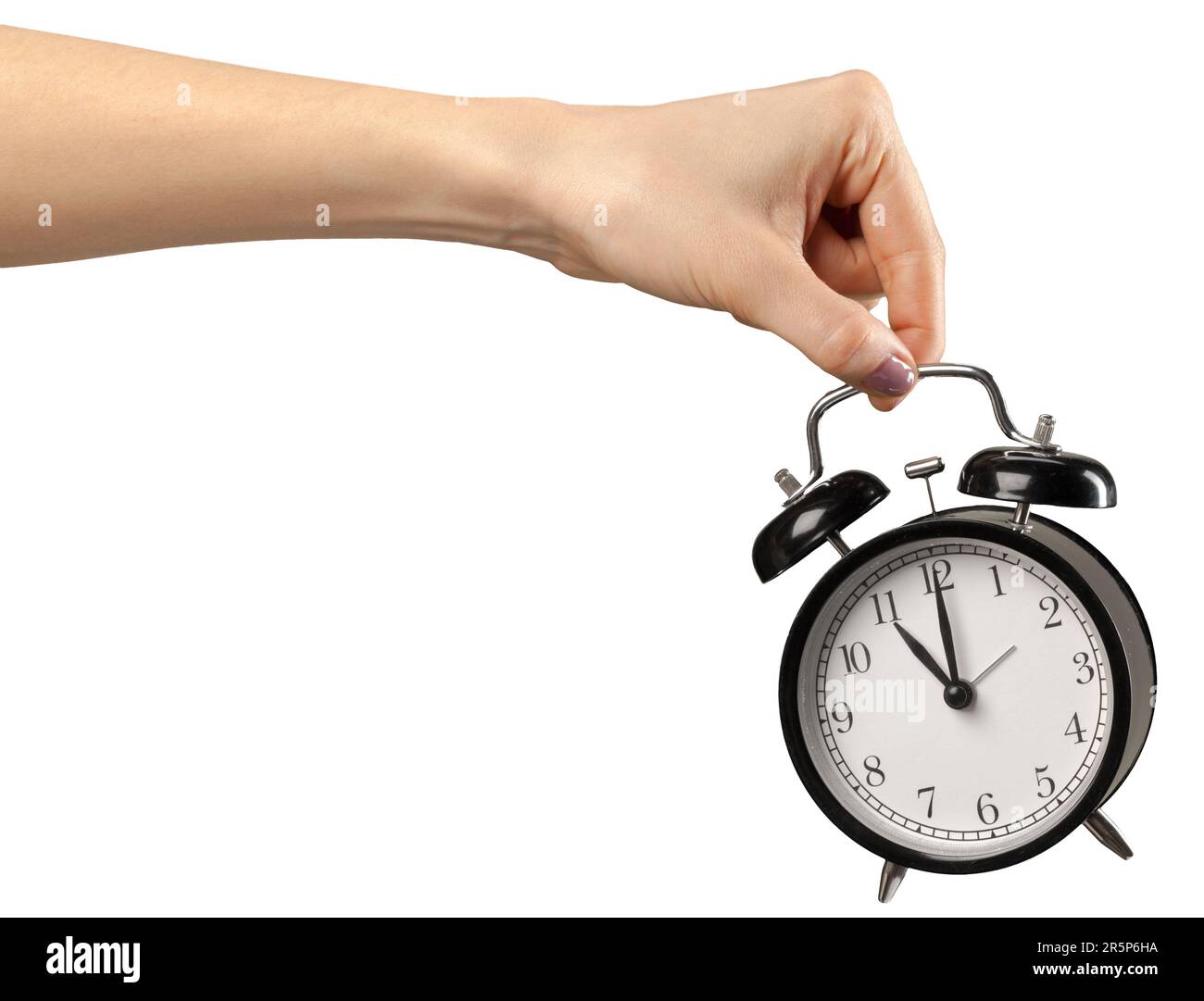 Hand holding retro alarm clock with white background Stock Photo - Alamy