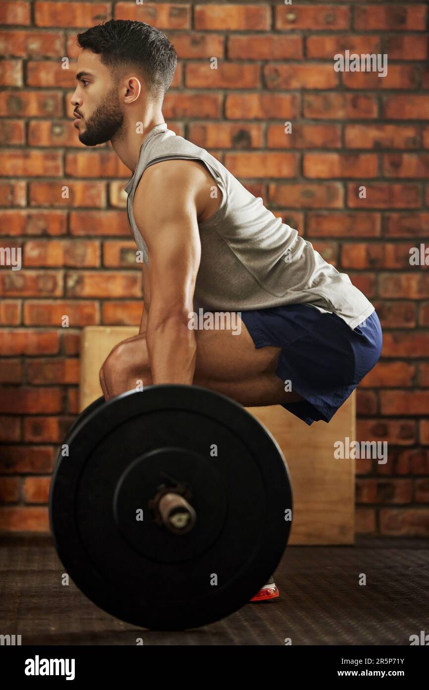 Weightlifting, workout and man with barbell for deadlift exercise ...