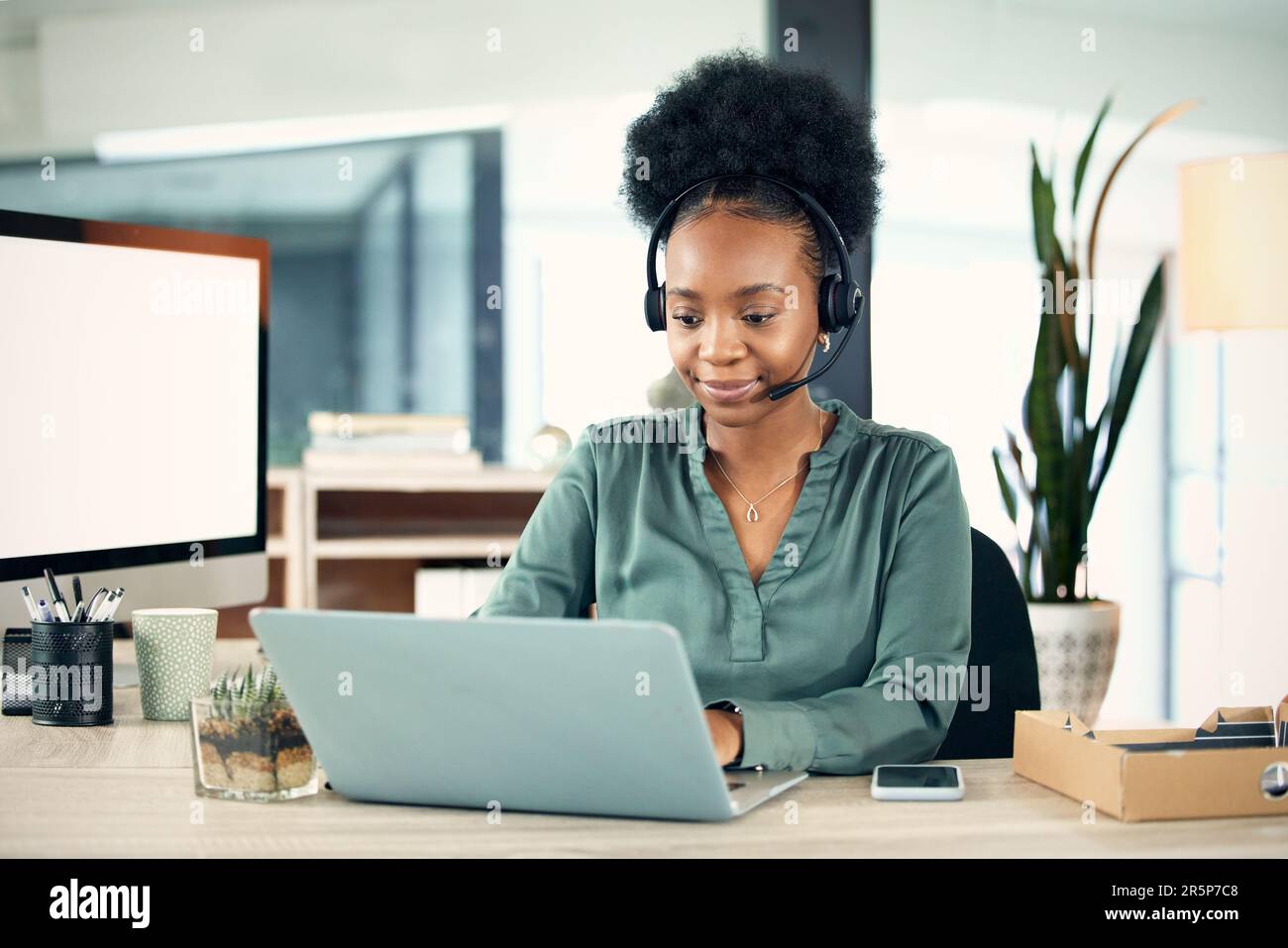 Business, call center and black woman with a laptop, telemarketing and ...