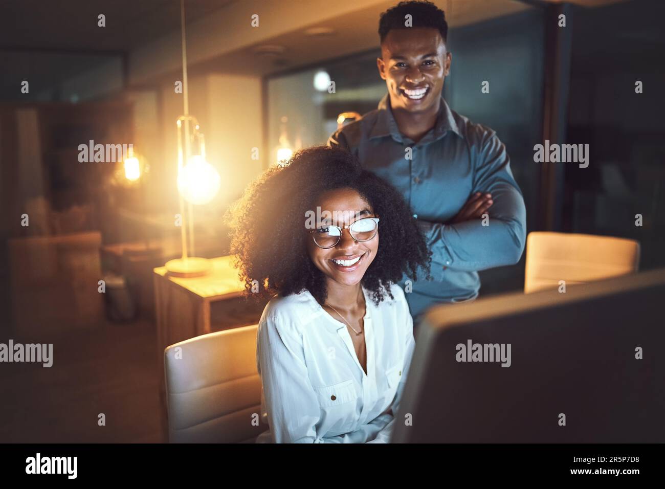 Were dedicated to finishing the task. Portrait of two businesspeople ...