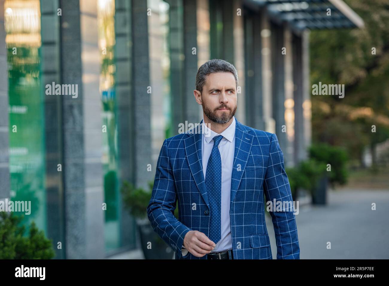 business employee walk outdoor. business employee on urban background ...