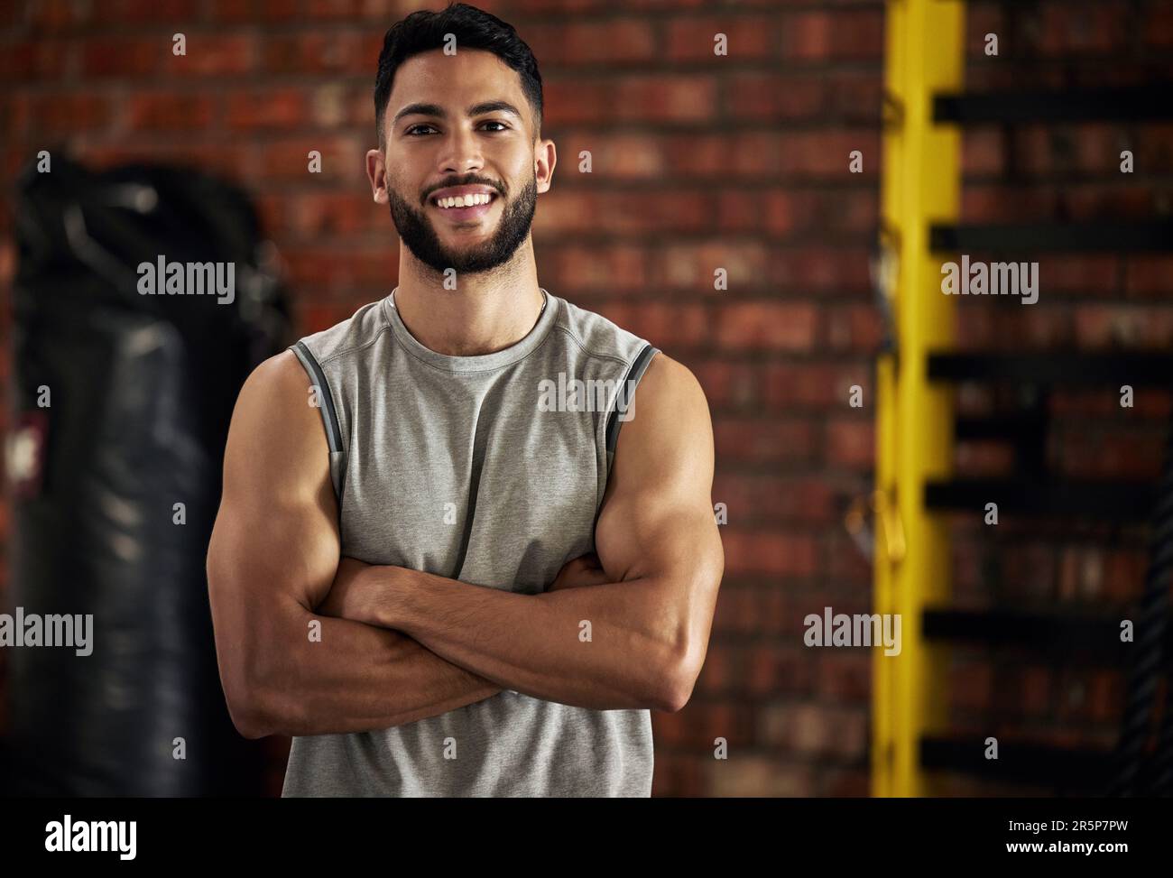 Gym, smile and portrait of man with arms crossed, fitness and happiness ...