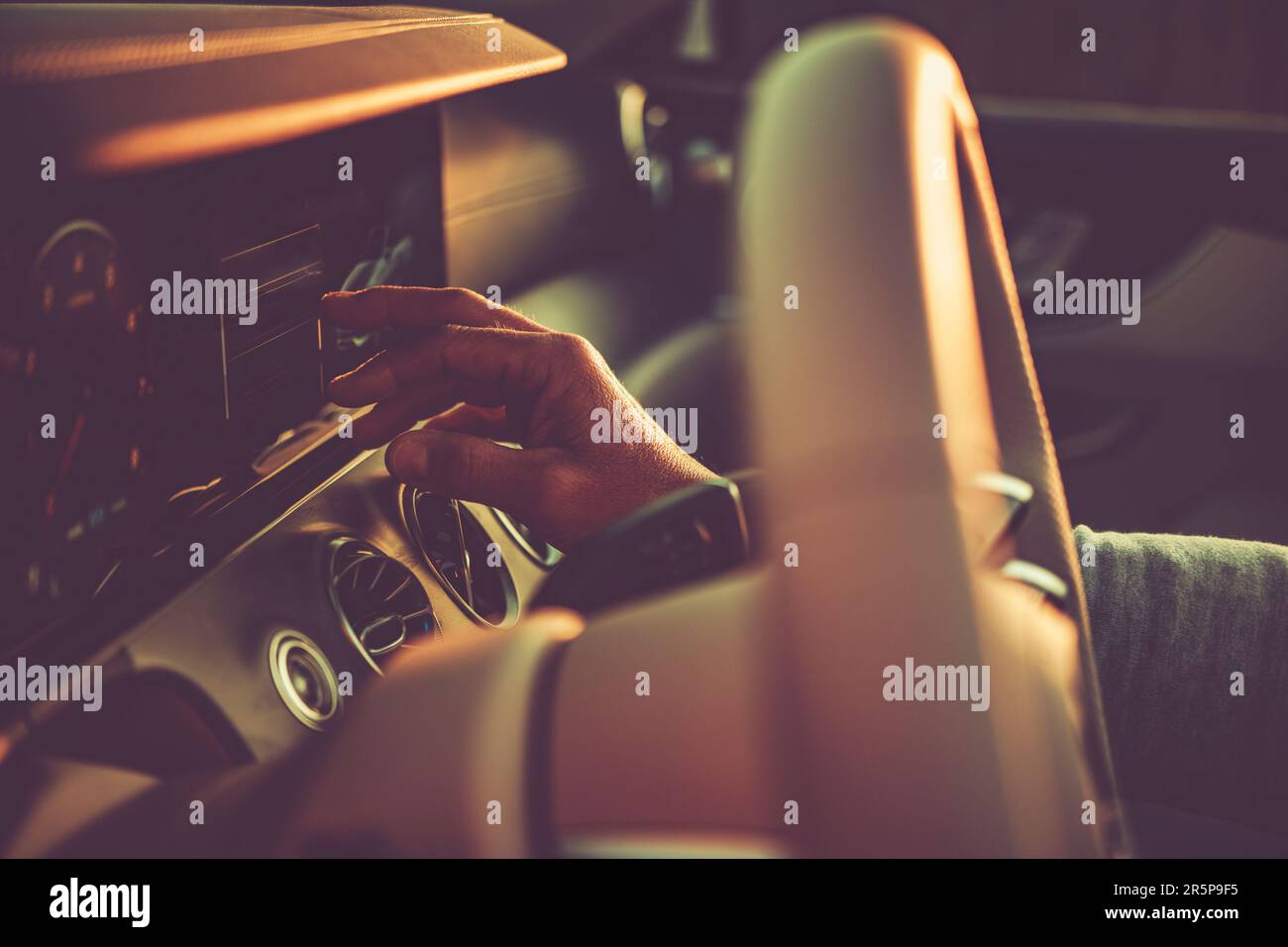 Caucasian Driver Setting Up Modern Car Infotainment Close Up Photo ...