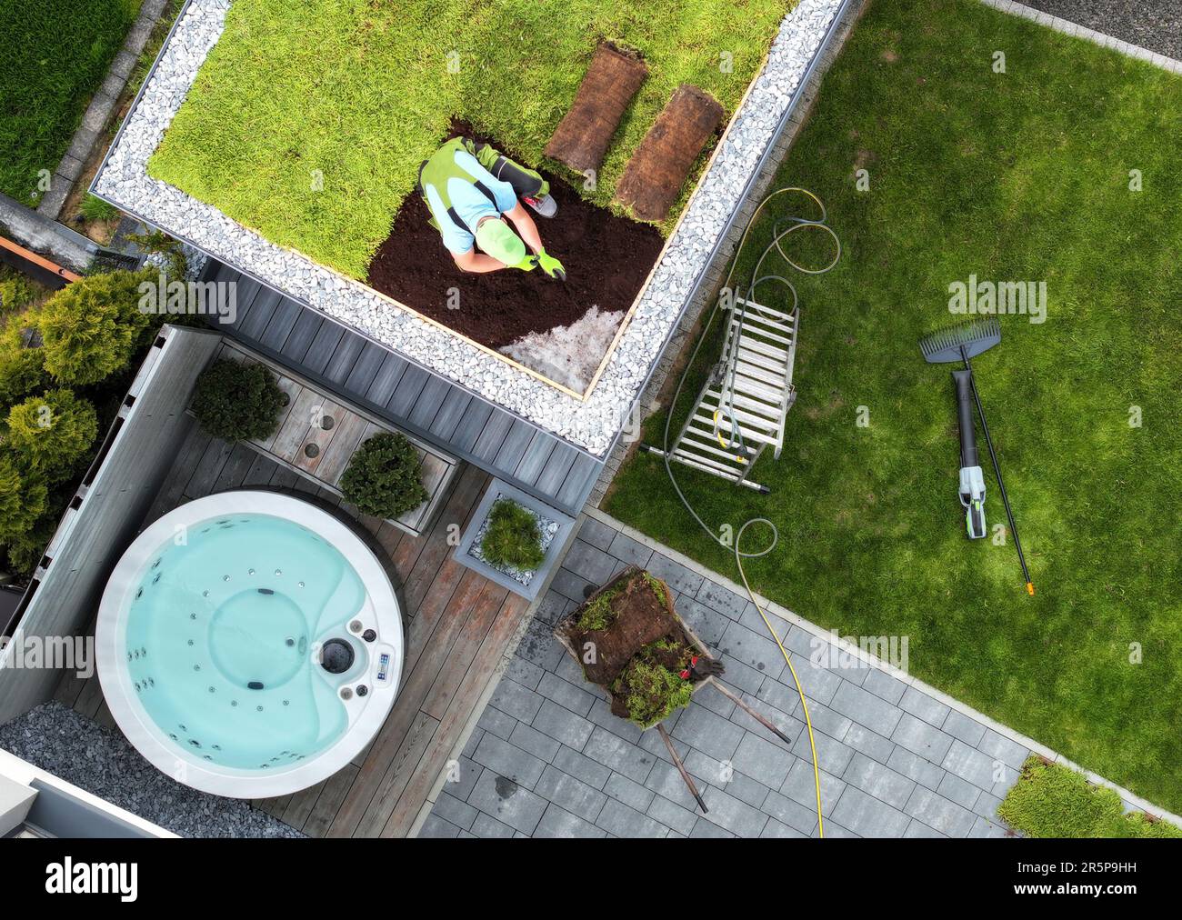 Aerial View of Green Sedum Roof Installation on a Garden Shed Performed ...