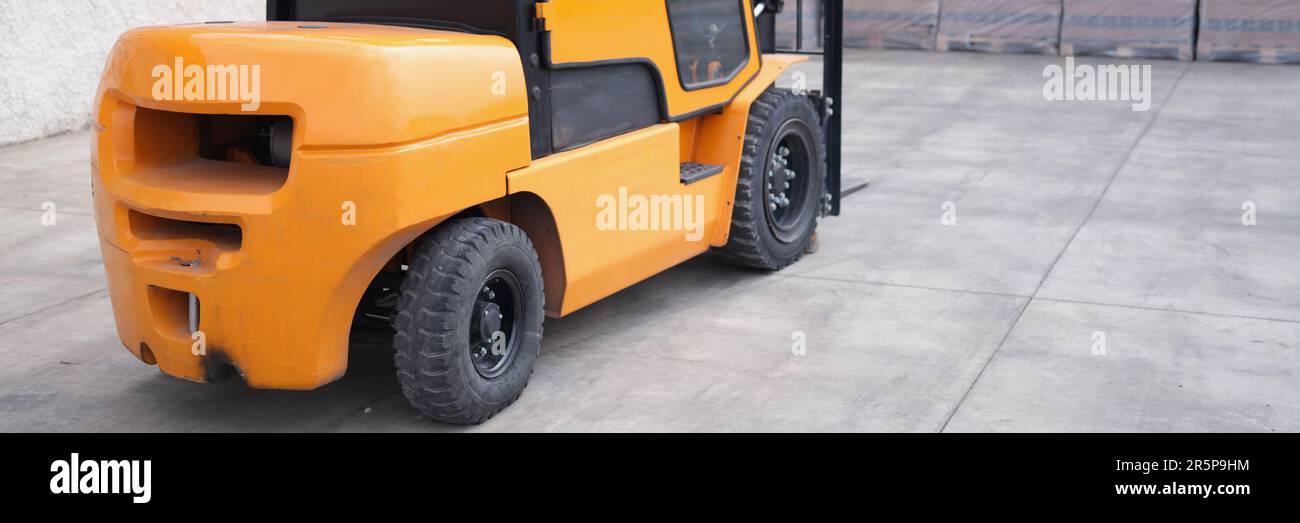 Parking forklift in logistics warehouse. Pallet stacking equipment ...