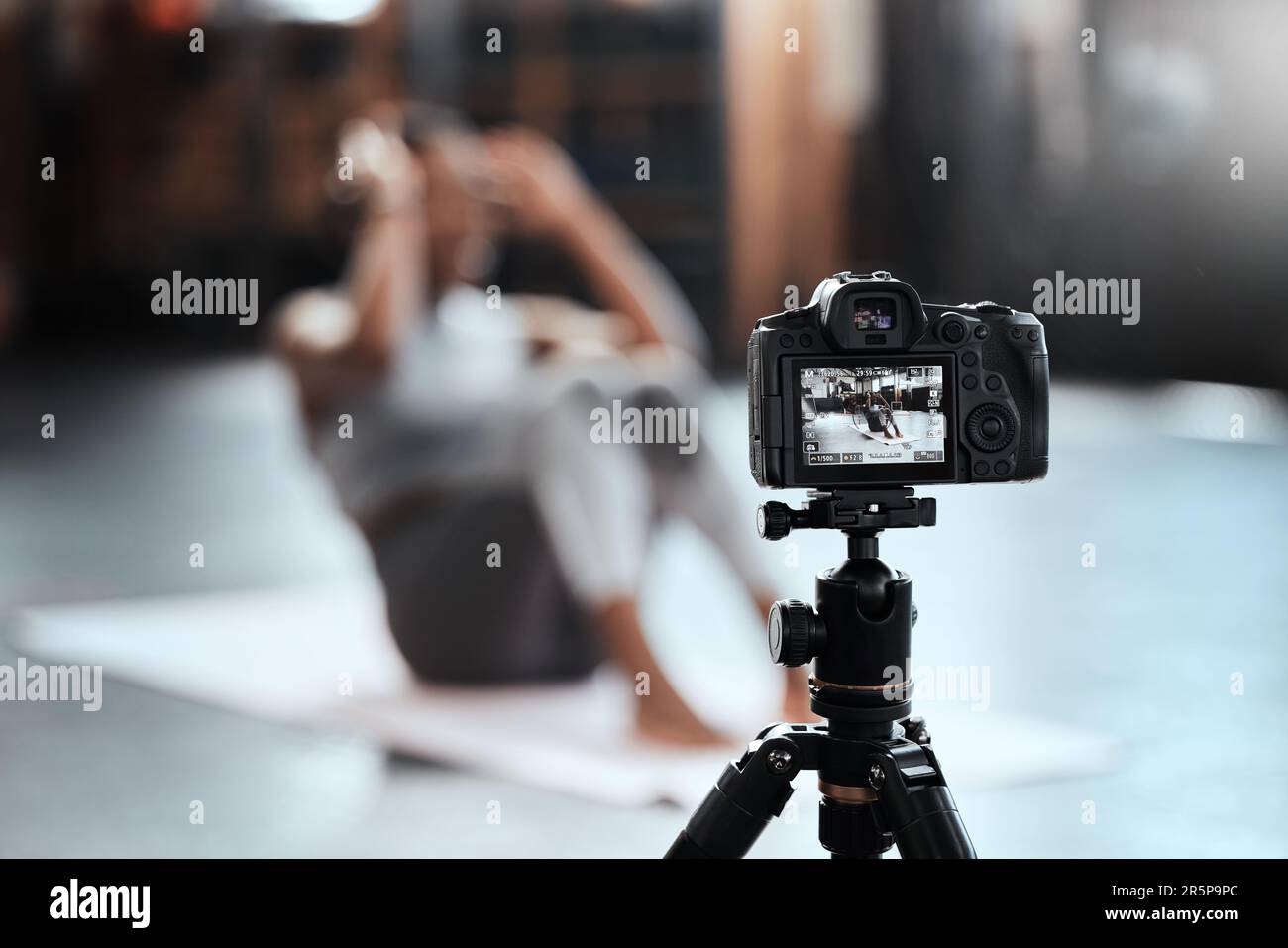 Recording, fitness and woman with a camera, exercise and training with ...