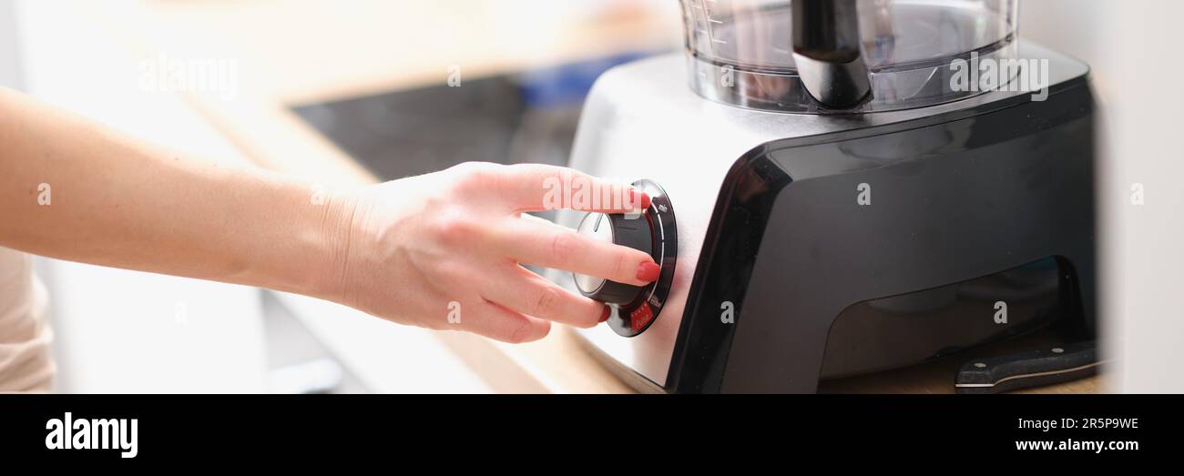 Cooking with mixer blender and kitchen utensils Stock Photo - Alamy