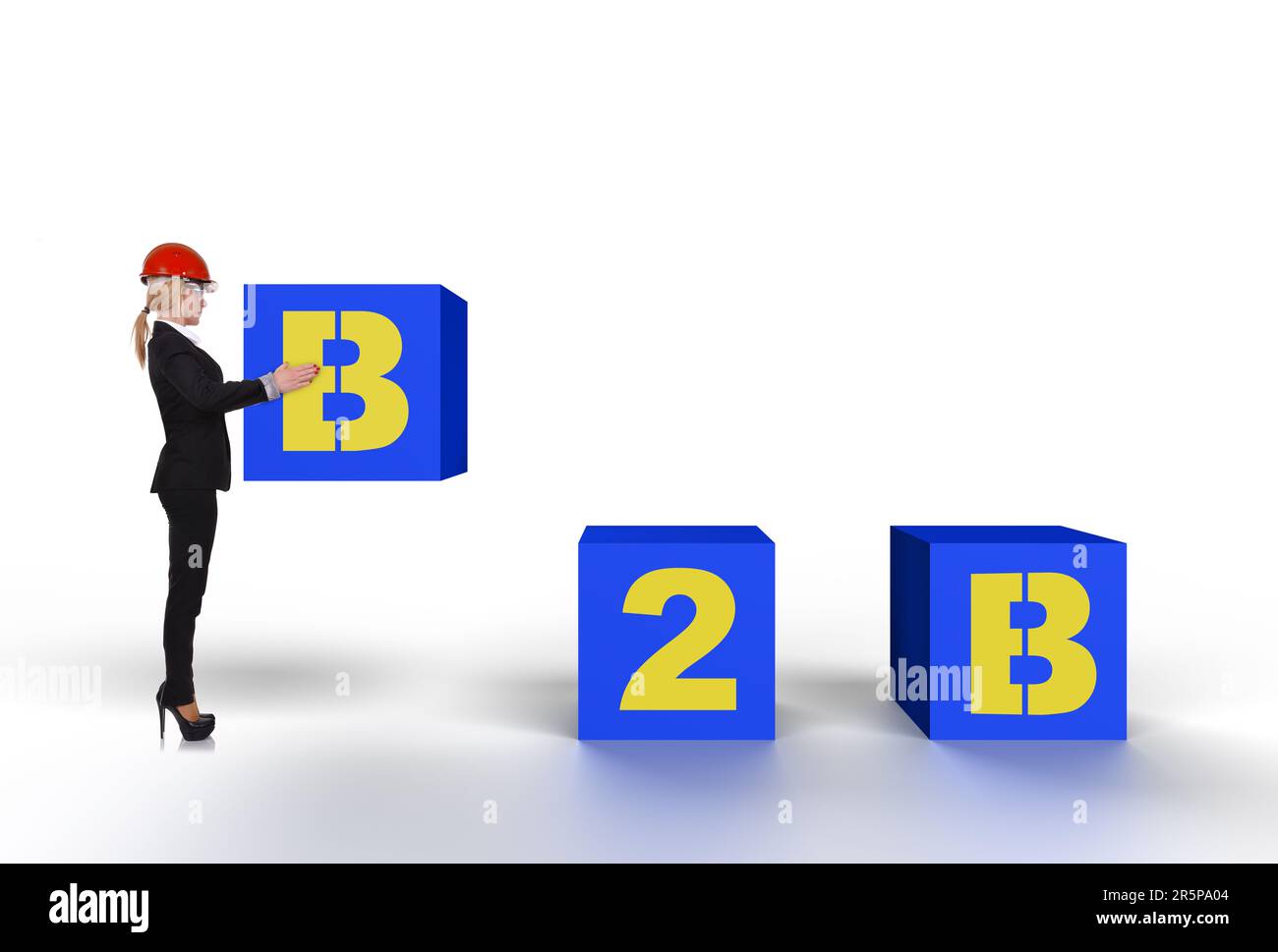 Woman engineer holding big cube, b2b concept Stock Photo - Alamy