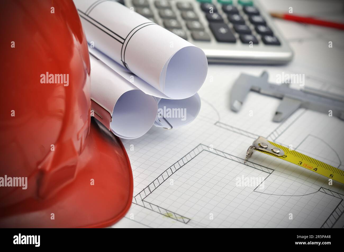 Workspace engineer, blueprint apartment and tools on desktop Stock ...