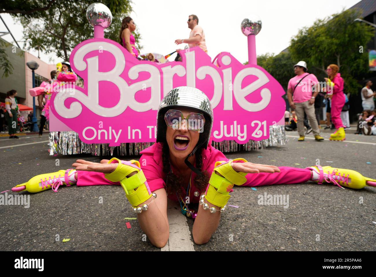 Dancer Kim Manning performs a routine to promote the film "Barbie" at ...