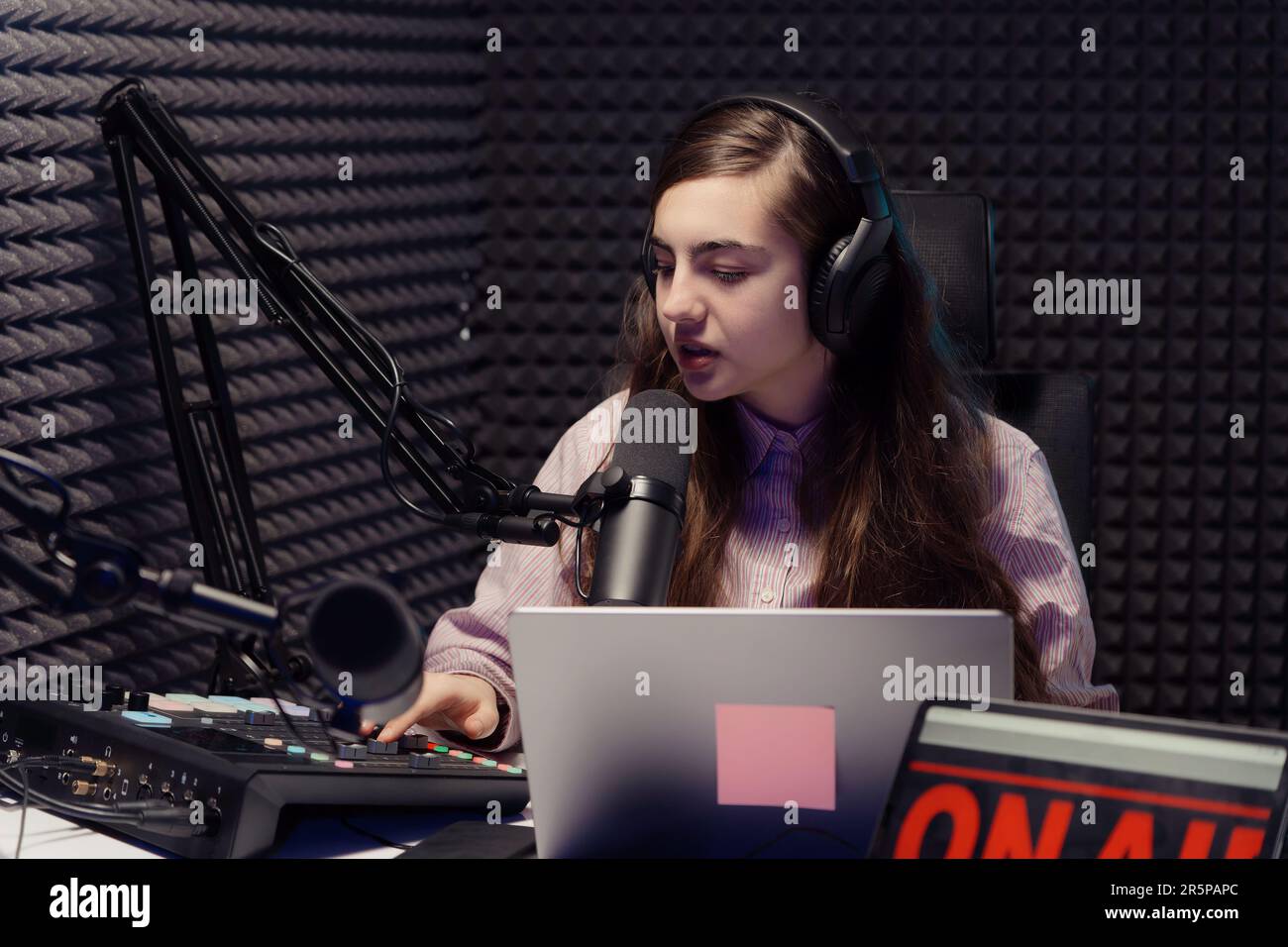 Female host broadcasting radio program Stock Photo - Alamy